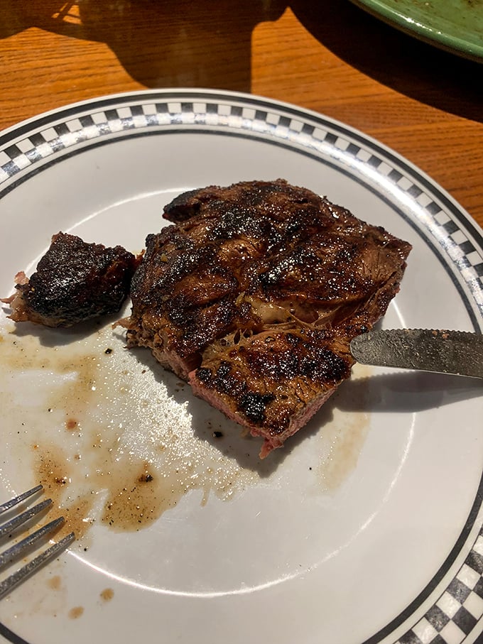 That classic checkered plate border frames the star attraction&mdash;a steak with char marks so perfect they could've been applied by an artist rather than a grill.
