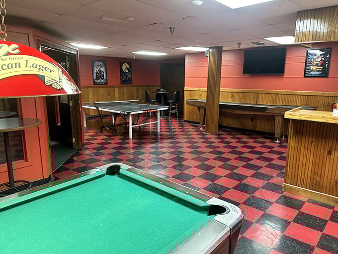 When your bowling arm needs a break, the billiards area offers a different kind of precision sport under the warm glow of classic Tiffany-style lamps.