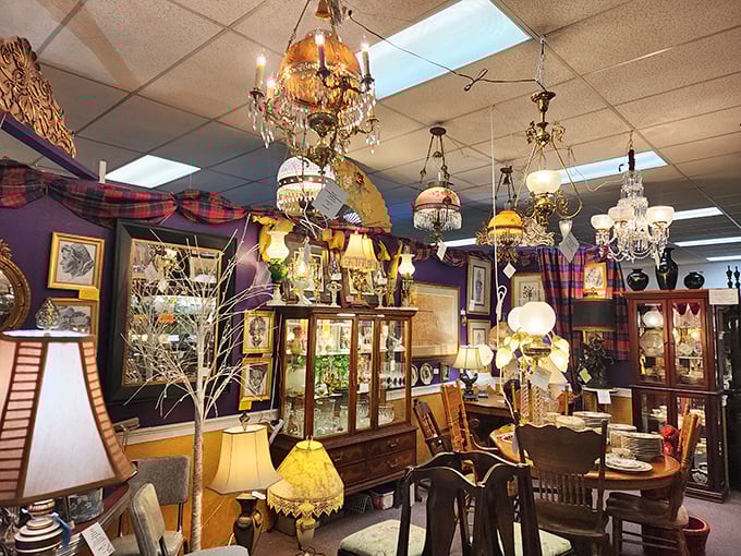 Chandeliers hang like crystallized memories, illuminating a booth where tartan and mahogany create a Scottish manor vibe.