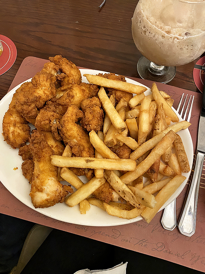 The perfect ratio of crispy chicken to golden fries&mdash;a plate that says "diet starts tomorrow" in the most convincing way possible.