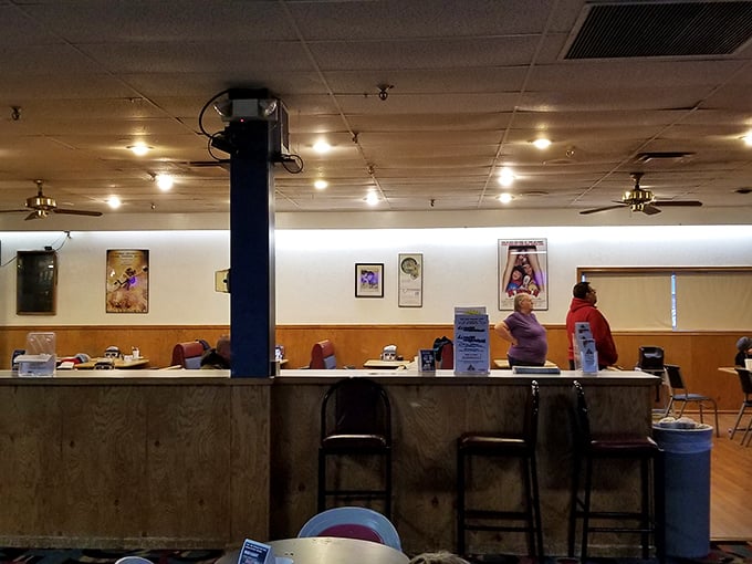 The no-frills counter area serves up bowling alley essentials&mdash;where conversations flow as freely as the beverages behind the bar.