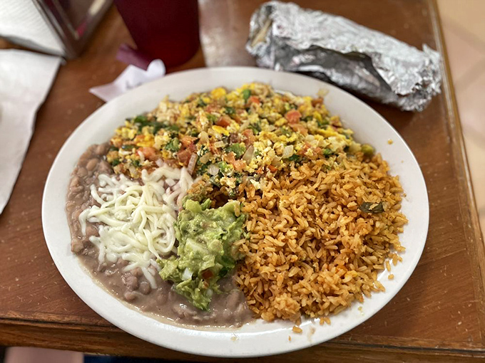 Where rice meets beans meets cheese meets heaven. The kind of plate that makes you question why you ever bothered with fancy restaurants.