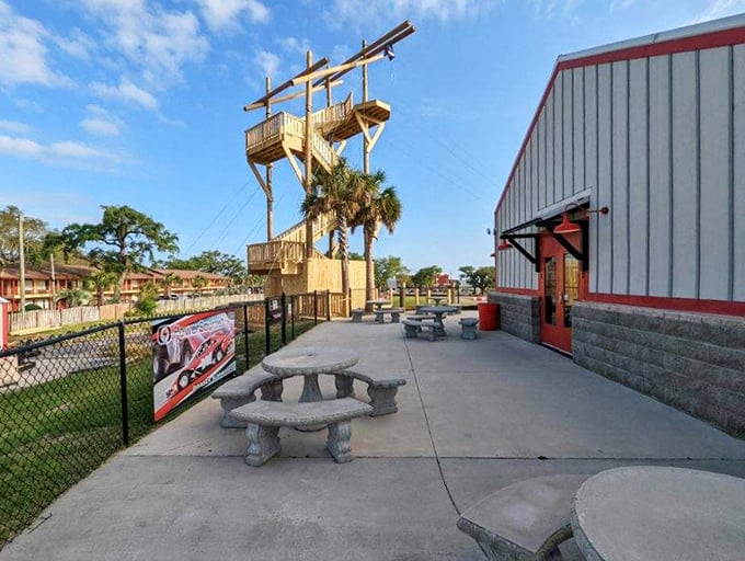 The observation tower watches over it all like a coastal lighthouse. Those picnic tables have witnessed countless victory celebrations and good-natured trash talk.