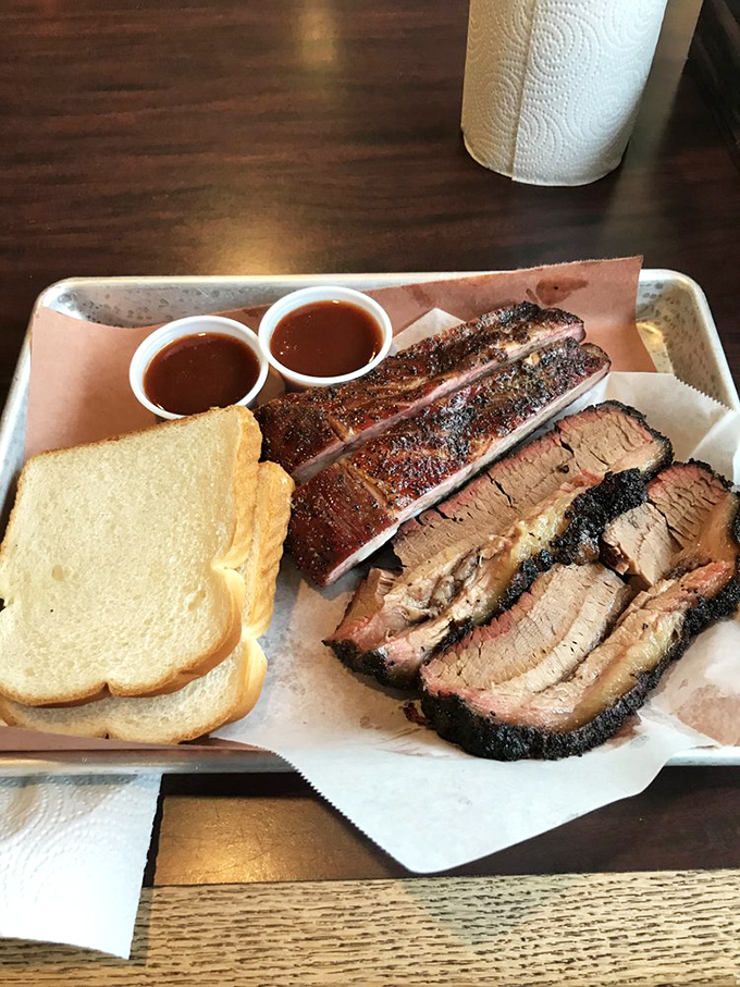 The barbecue board of your dreams&mdash;ribs with perfect bend, brisket with textbook smoke ring. Those two sauce cups are merely suggestions; this meat needs no enhancement.