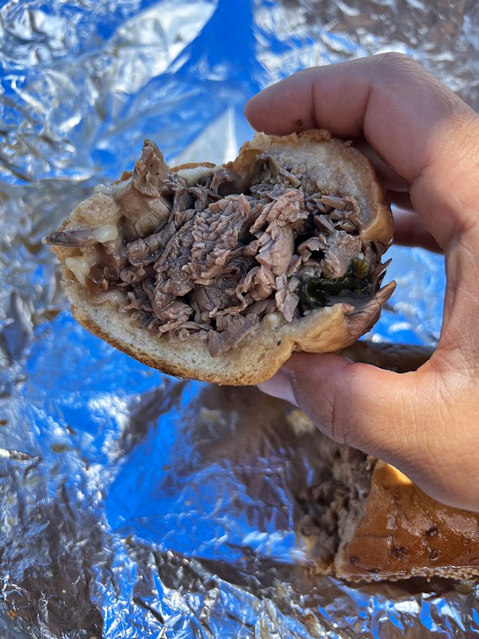 Cross-section of perfection. Tender roast beef piled high on a roll that's somehow both sturdy and yielding&mdash;an architectural marvel.