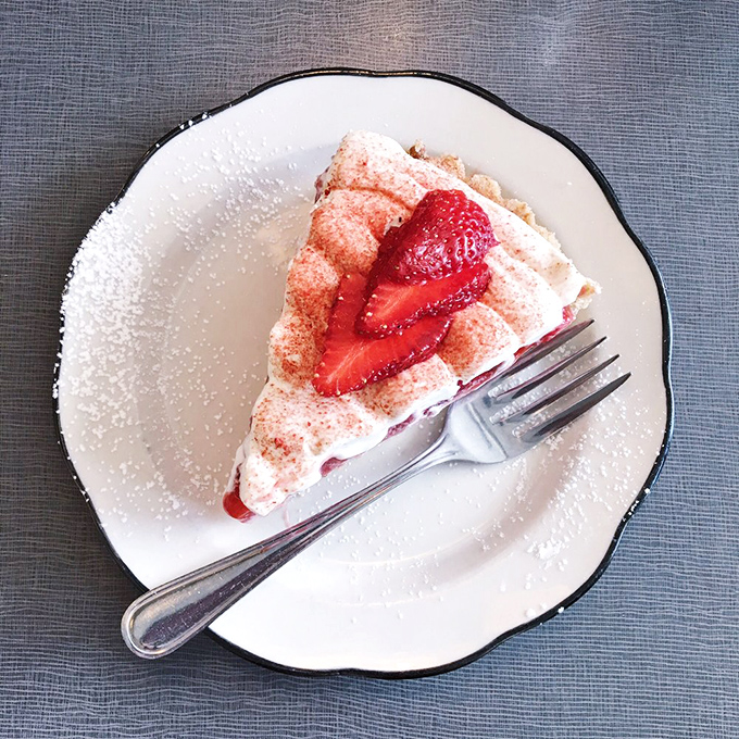 Strawberry cream pie that looks like it should be in the Louvre&mdash;the powdered sugar dusting is the artist's final, perfect touch.
