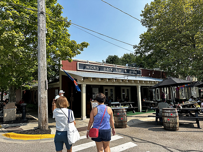 Wicks Park Bar & Grille offers that perfect Michigan summer moment when cold drinks, outdoor seating, and lakeside breezes conspire to make you extend your stay.