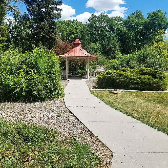 Wilson Park's gazebo stands like a quiet invitation to slow down and embrace the simple pleasure of a moment's peace.