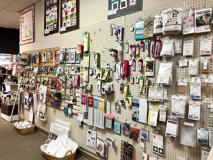 The notions wall&mdash;where quilting's supporting actors await their moment to shine. Those tiny tools perform mighty feats in skilled hands.