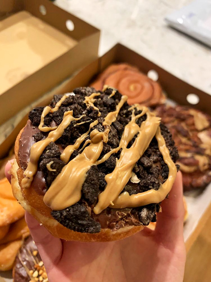 This chocolate-oreo-peanut butter masterpiece isn't just a donut, it's a dessert with ambition. Breakfast? Dessert? Why choose?