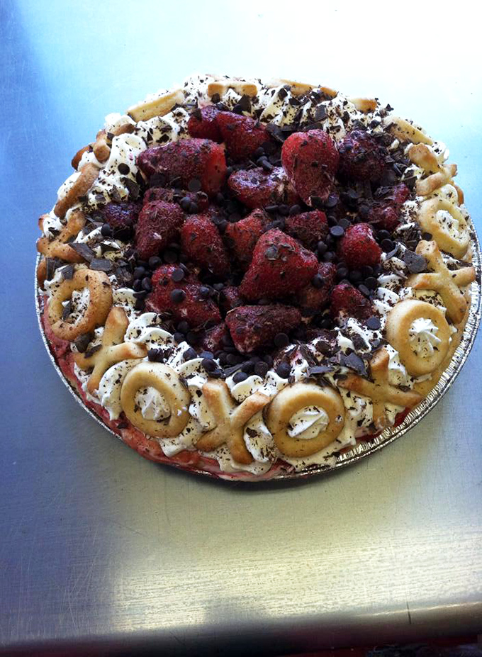 This strawberry masterpiece isn't just a pie; it's what dessert dreams whisper about when nobody's listening.