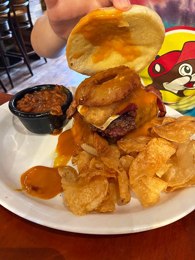 Behold the 420 Burger in all its gravity-defying glory, equipped with chips and beans for when hunger strikes with serious intentions.