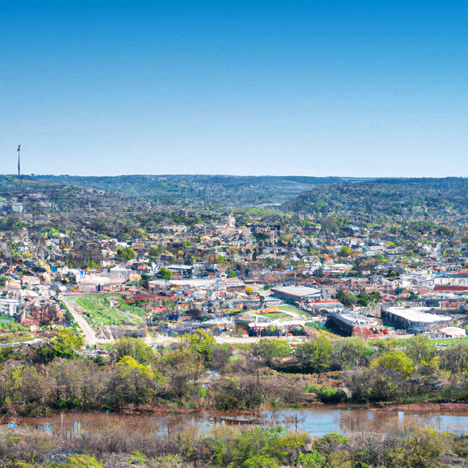 From above, Sulphur reveals itself as a verdant oasis nestled among rolling hills, with the town center embraced by the natural beauty that defines it.