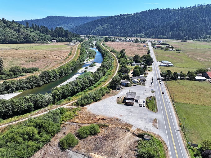 From above, Orick reveals its perfect positioning&mdash;nestled between winding river, fertile valley, and forest-cloaked mountains.