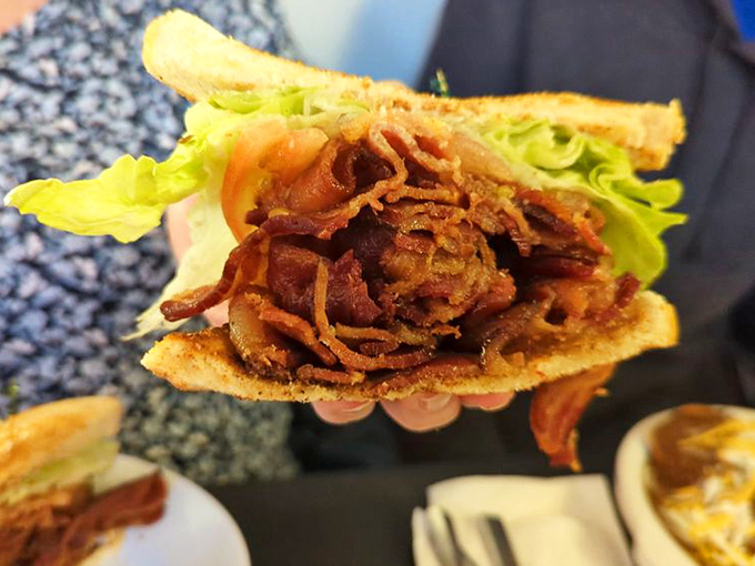 The legendary BLT doesn't merely include bacon—it celebrates it with a mountain of crispy strips that would make even Elvis pause.