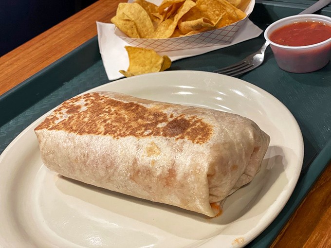 This barbacoa burrito isn't just a meal&mdash;it's architecture. Perfectly grilled exterior giving way to a meticulously layered interior that puts most Manhattan apartments to shame.