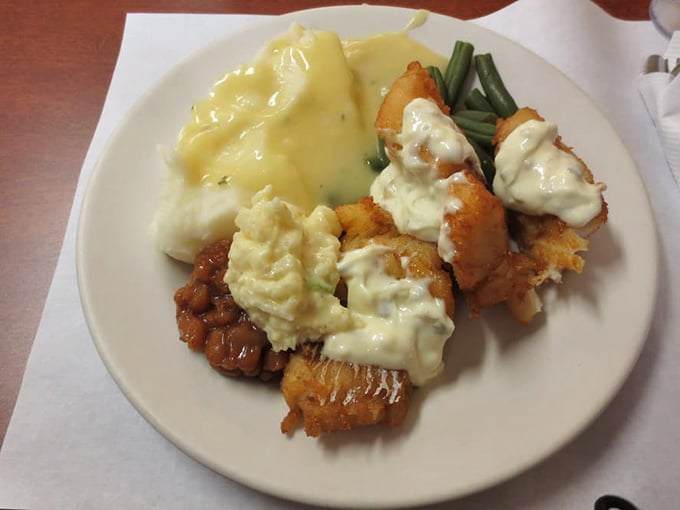The seafood platter whispers sweet nothings to your taste buds with hand-battered cod draped in homemade tartar sauce.