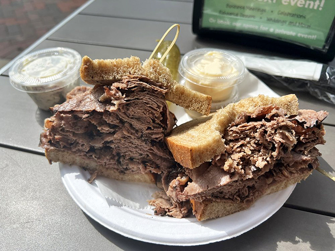 This isn't just a beef brisket sandwich; it's a monument to patience. Slow-cooked meat that practically dissolves on contact with your taste buds.