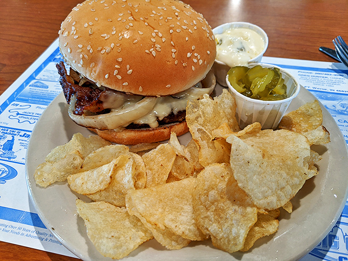 A burger that requires both hands and possibly a building permit. Those house-made pickles add the perfect tangy counterpoint.