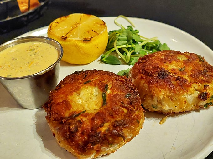 These golden-crusted crab cakes contain so much actual crab, they should come with their own fishing license.