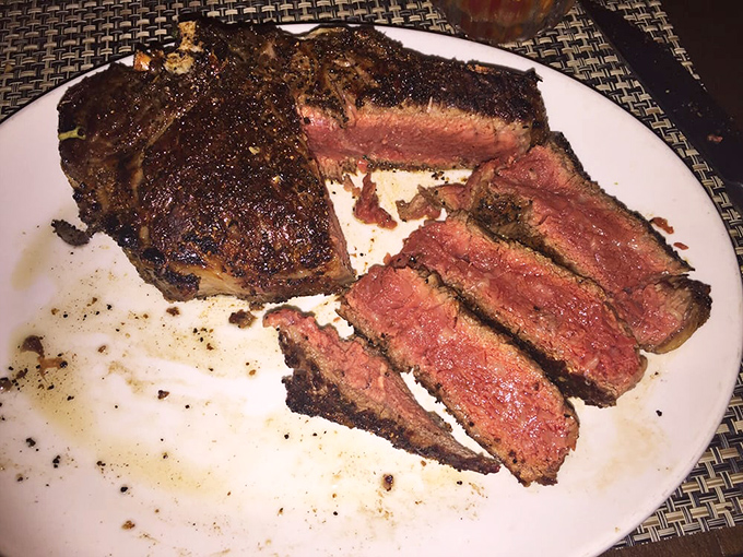 The bone-in prime strip: where primal meets refined. That perfect crust is what separates civilization from chaos.