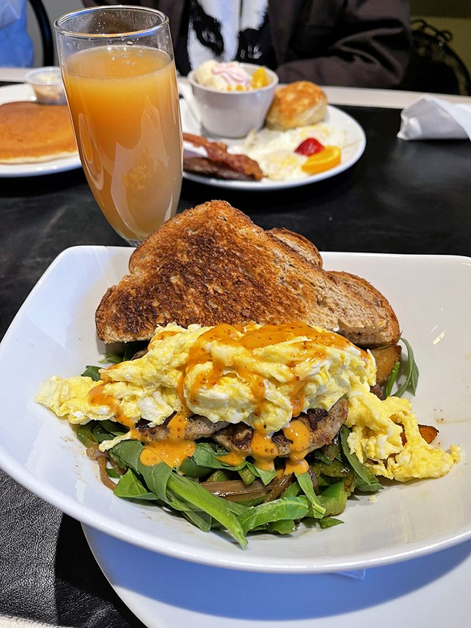 This breakfast bowl isn't messing around&mdash;eggs draped over saut&eacute;ed vegetables with a sauce that's asking for a Nobel Prize in morning deliciousness.