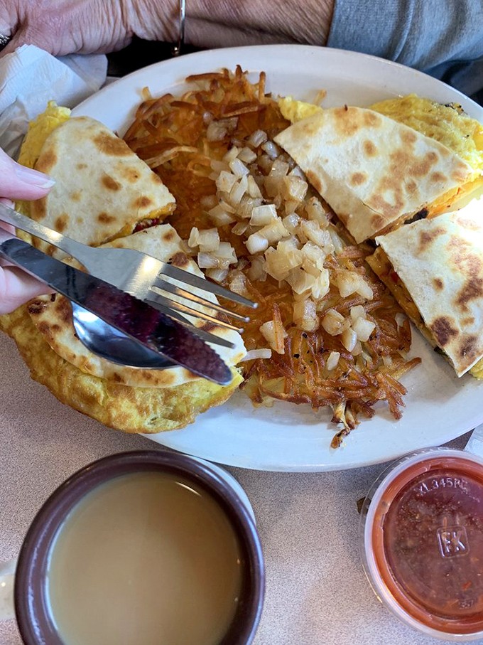 Breakfast quesadillas: where morning meets Mexico in a glorious union of eggs, cheese, and tortilla. The coffee's ready to play matchmaker.