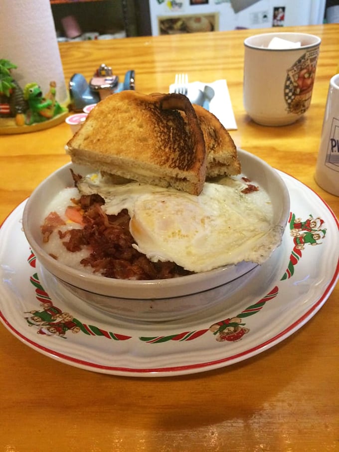 Comfort in a bowl: crispy potatoes, perfectly runny eggs, and enough savory goodness to make you contemplate a mid-meal nap.