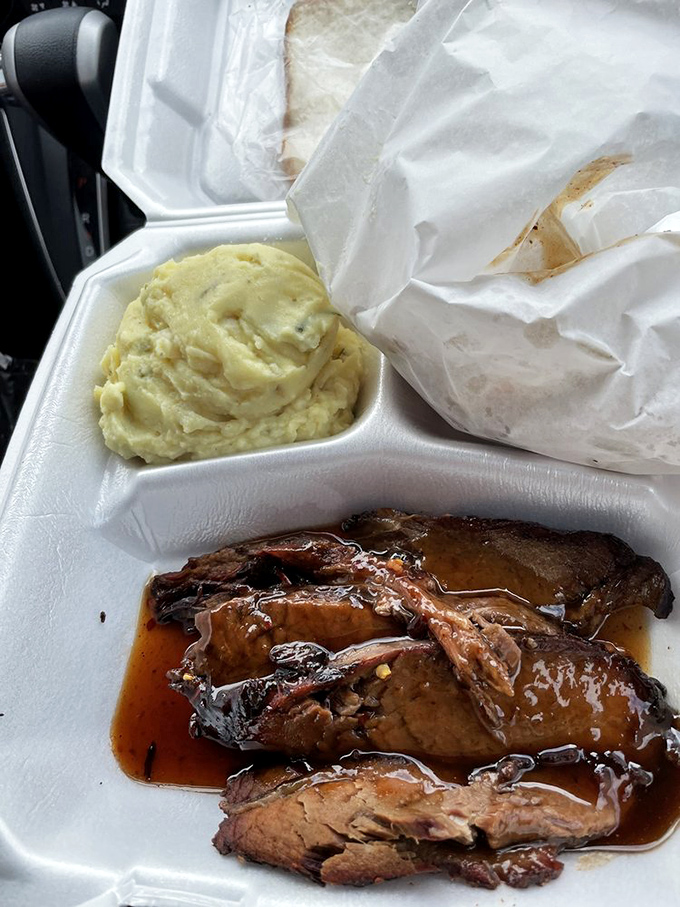 When brisket meets sauce in a styrofoam container, magic happens. That potato salad isn't just a side&mdash;it's moral support for your main event.