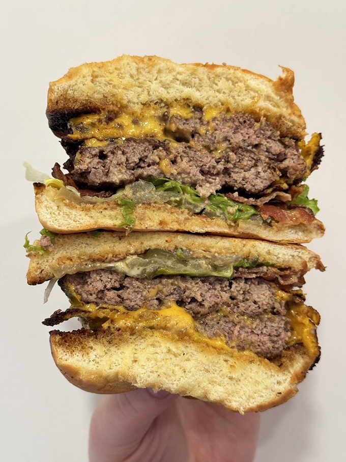 Cross-section perfection! Like a geological expedition through layers of beef, cheese, and veggies&mdash;each bite a different delicious discovery.