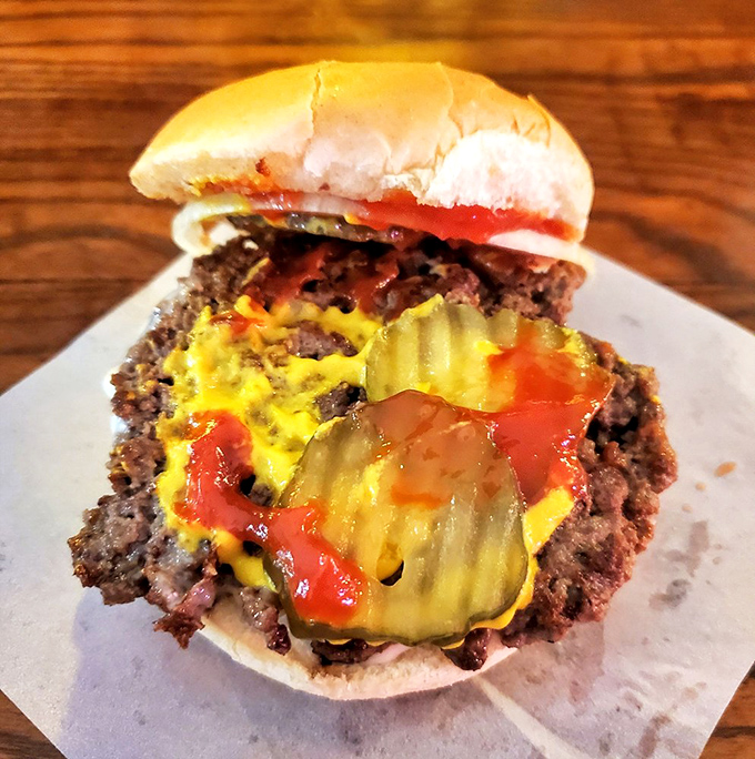 The magic of a Booches burger lies in its perfect proportions. Every bite delivers the ideal ratio of meat, cheese, and bun &ndash; culinary mathematics at its finest.