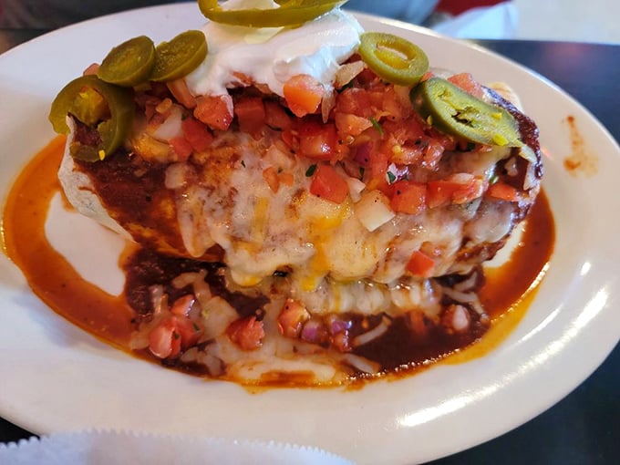 Burrito architecture at its finest. Like a well-constructed novel, each layer reveals a new plot twist of flavor, topped with the perfect epilogue of jalape&ntilde;os.