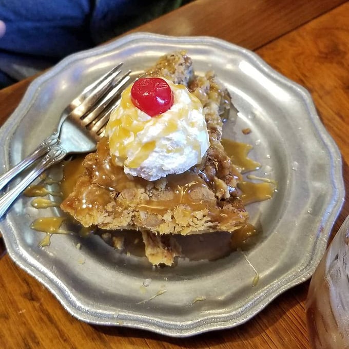 This butterscotch pecan pie doesn't just satisfy a sweet tooth&mdash;it creates a lifelong dependency. That cherry on top? Pure showmanship.