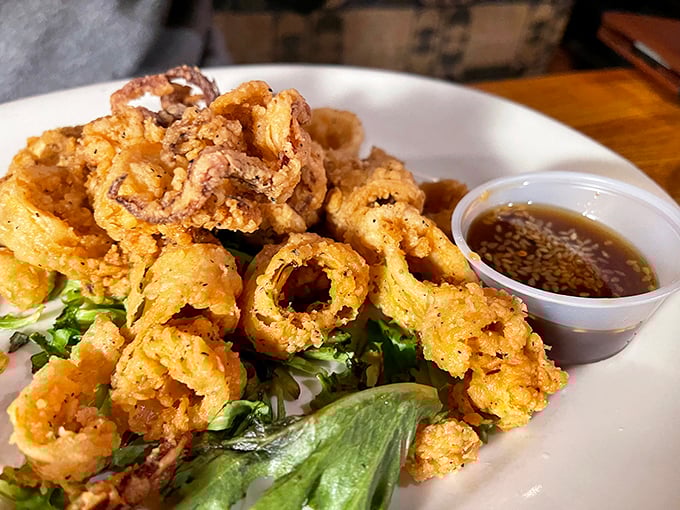 Calamari so perfectly fried it makes you wonder why anyone would ever describe something delicious as "tough as an old boot."