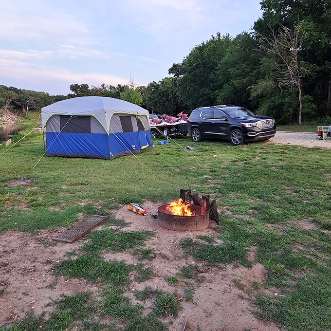 Home sweet temporary home. Nothing says "I'm officially relaxing" like a tent, a campfire, and absolutely zero emails to check.