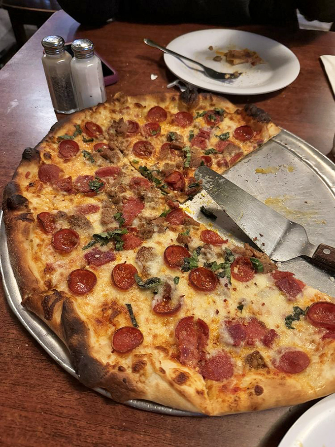 This carnivore pizza isn't just food&mdash;it's a monument to meat lovers everywhere. The kind of pizza that makes vegetarians reconsider their life choices.