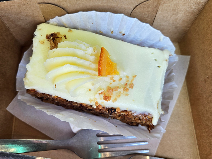 The cross-section reveals the truth&mdash;this isn't just carrot cake, it's carrot architecture. Each moist layer supports a perfect ratio of cream cheese frosting.