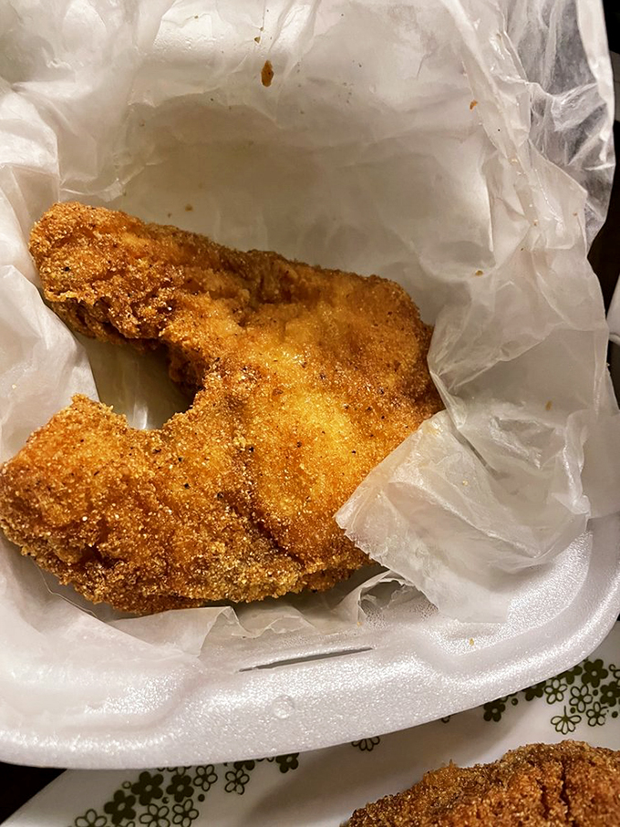 Behold the ultimate proof that cornmeal breading is seafood's perfect dance partner—these catfish steaks are crispy on the outside, tender within.