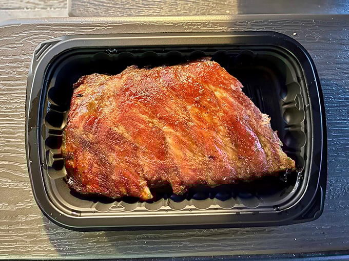 Center-cut pork ribs with that telltale pink smoke ring&mdash;the barbecue equivalent of finding front-row concert tickets in your coat pocket from a show you forgot you attended.