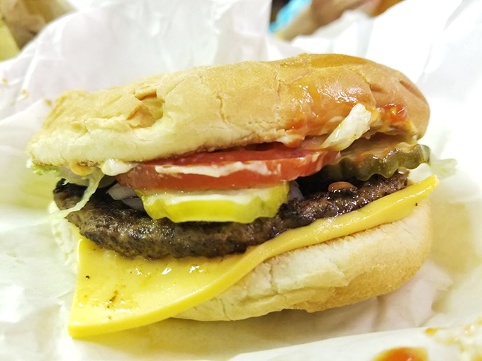 This isn't just a cheeseburger; it's a masterclass in balance. Note how the cheese drapes just so over the patty&mdash;architectural perfection.