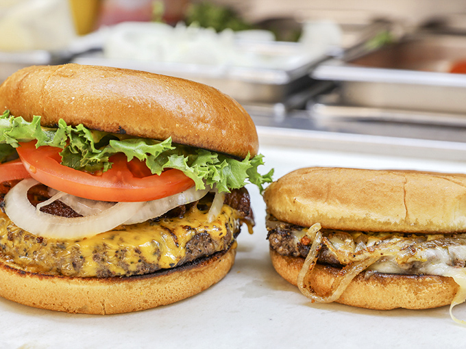 The classic Giant Burger in all its glory. That melted cheese cascading down the sides is performing a dairy waterfall dance that deserves its own Vegas show.