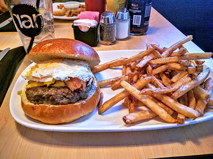 The breakfast-meets-lunch masterpiece that answers the eternal question: "Why choose between bacon, egg, and burger when you can have all three?"