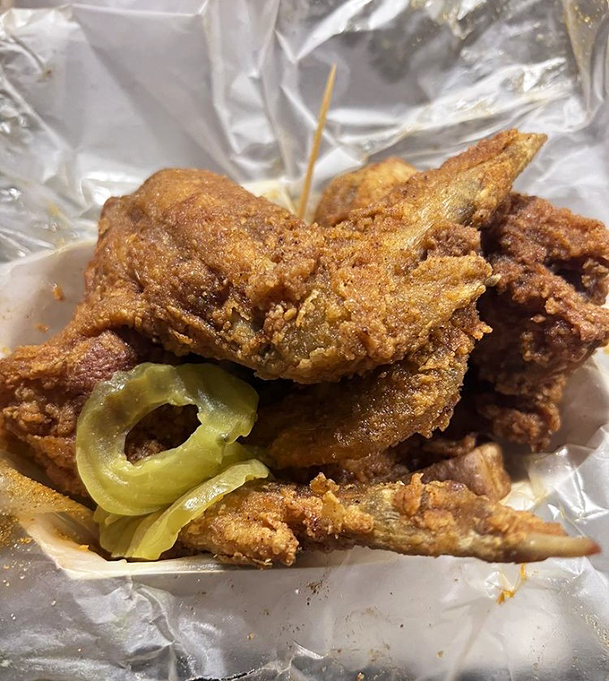Golden-fried wings with pickle chips&mdash;nature's coolant system for the impending heat wave about to hit your taste buds.