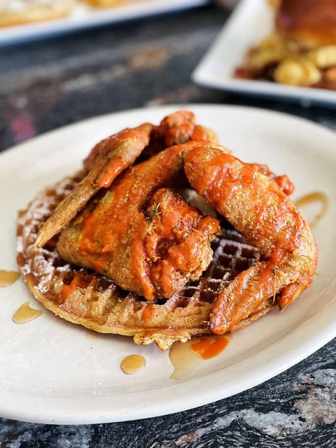 The holy matrimony of crispy chicken and fluffy waffle, blessed with a drizzle of syrup. Some relationships are just meant to be.