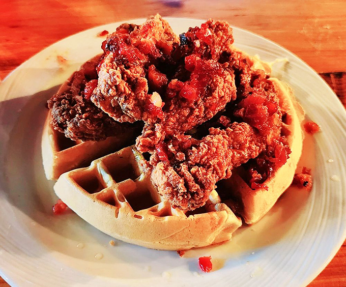 Chicken and waffles: where breakfast and dinner stop fighting and start a beautiful friendship that changes lives one crispy, syrupy bite at a time.