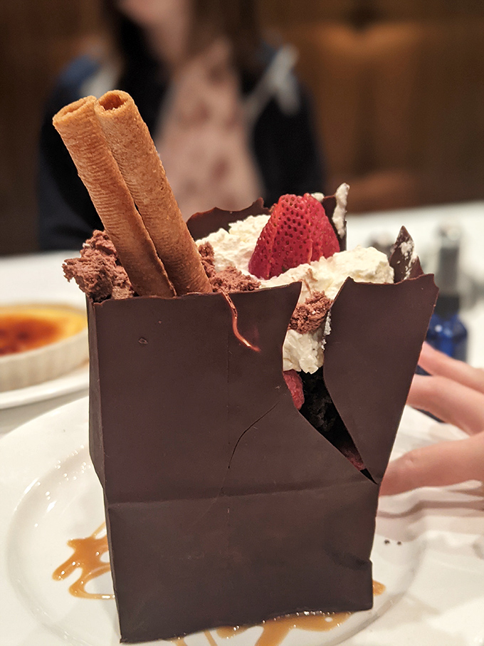 Some desserts are meant to be photographed; this chocolate construction with fresh strawberries and cream is meant to be demolished with childlike glee.