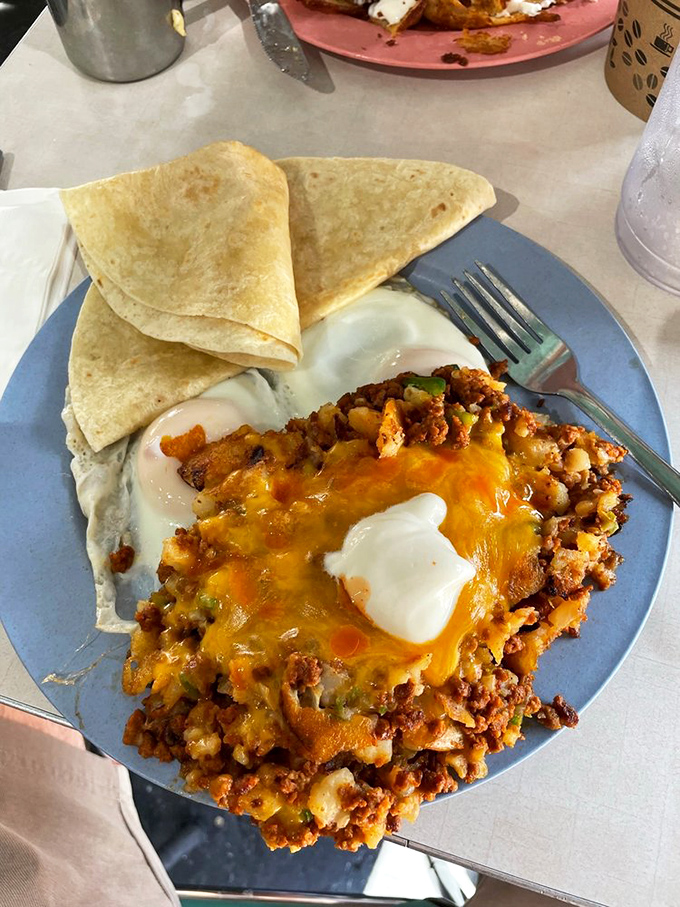 The chorizo hash hits all five taste buds plus the sixth one&mdash;satisfaction. Those tortillas aren't just for decoration; they're essential tools for the serious breakfast explorer.