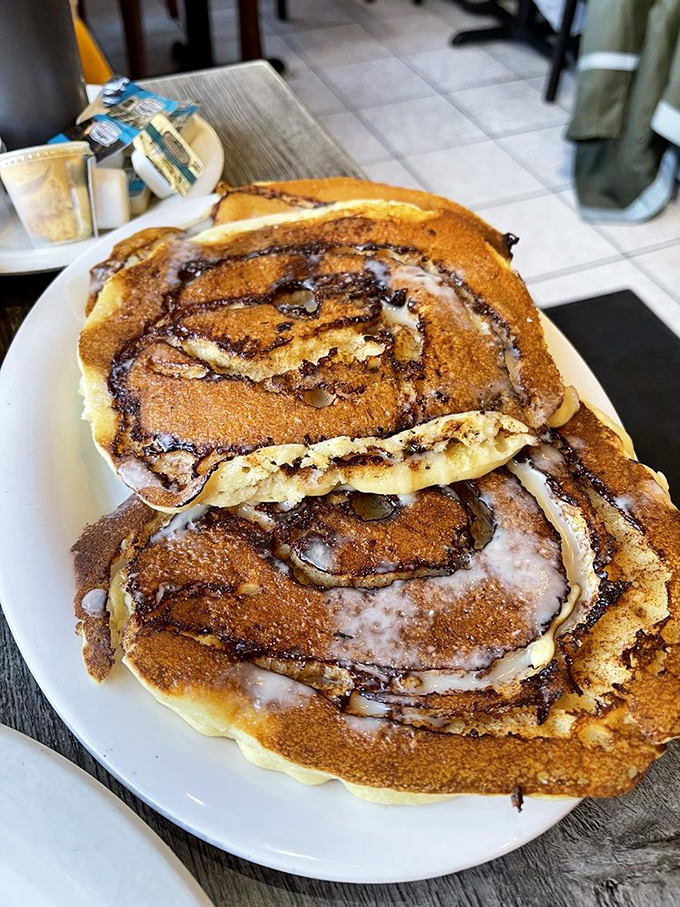This cinnamon swirl pancake isn't just breakfast&mdash;it's dessert that got up early, wearing its frosting like a cozy bathrobe on a Sunday morning.