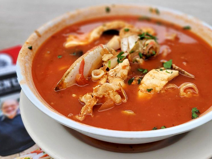 Cioppino so hearty it could sustain a fishing crew through winter &ndash; a tomato-based symphony where every spoonful tells a different seafood story.