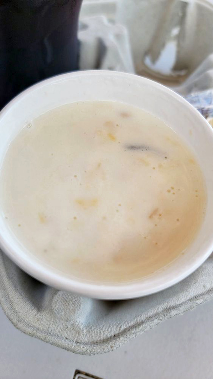 This isn't just chowder; it's a creamy ocean in a cup, with tender morsels of seafood playing hide and seek in every spoonful.